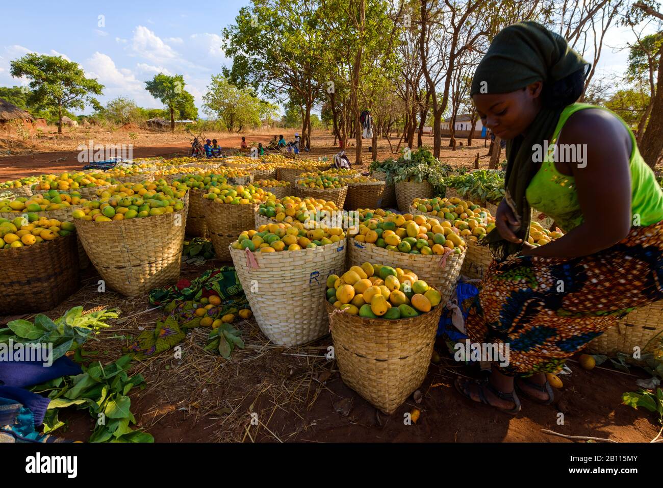 Woman mango hi-res stock photography and images - Alamy