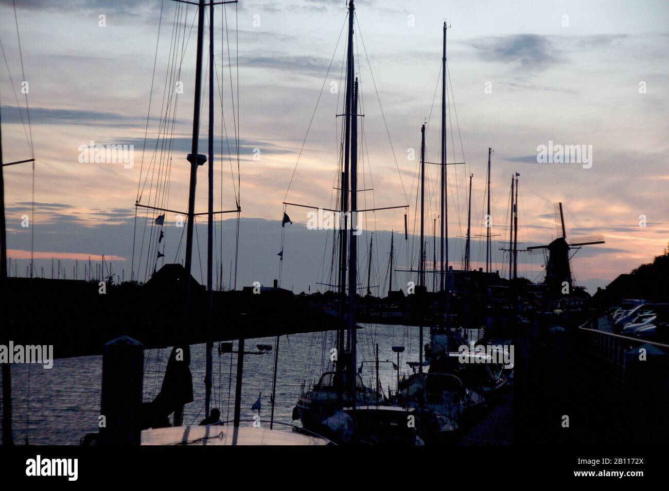 Sky and channel in sunset of Zeeland travel Stock Photo - Alamy