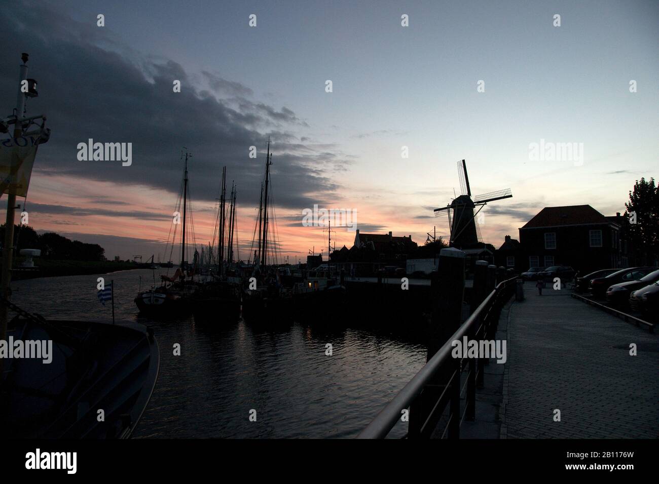 Sky and channel in sunset of Zeeland travel Stock Photo - Alamy