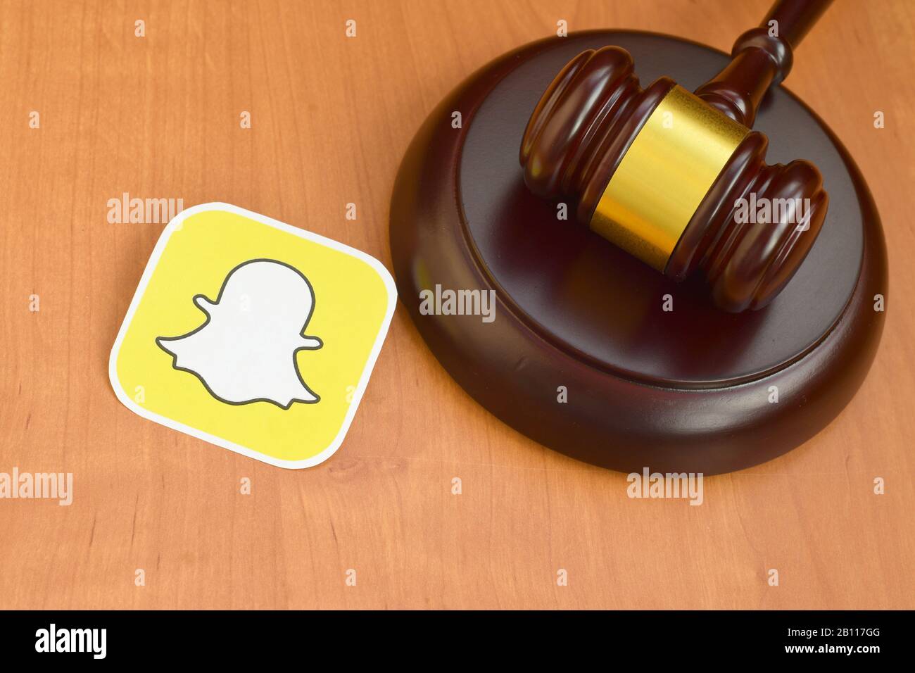 KHARKOV, UKRAINE - FEBRUARY 17, 2020: Snapchat paper logo lies with ...