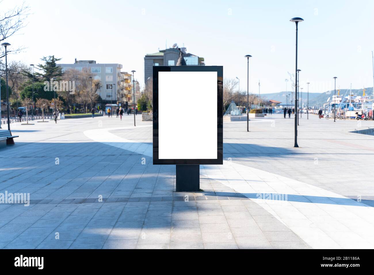 Vertical blank billboard on the city street Stock Photo - Alamy
