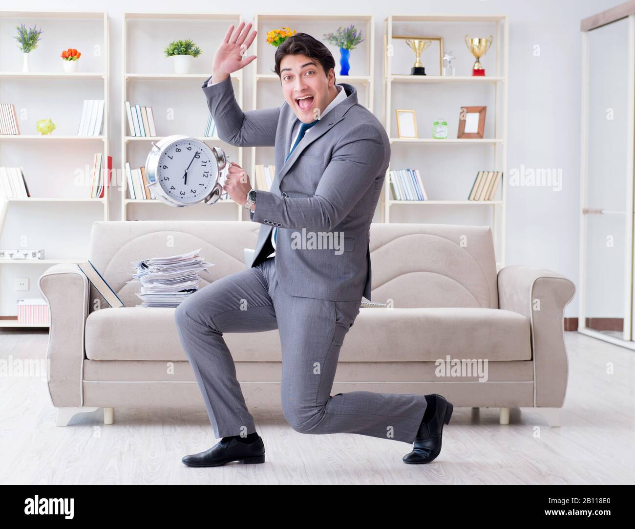 The businessman happy meeting his deadlines Stock Photo - Alamy