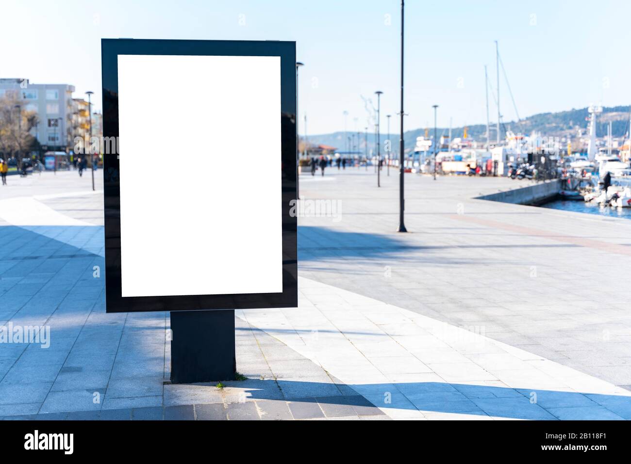 Vertical blank billboard on the city street Stock Photo - Alamy