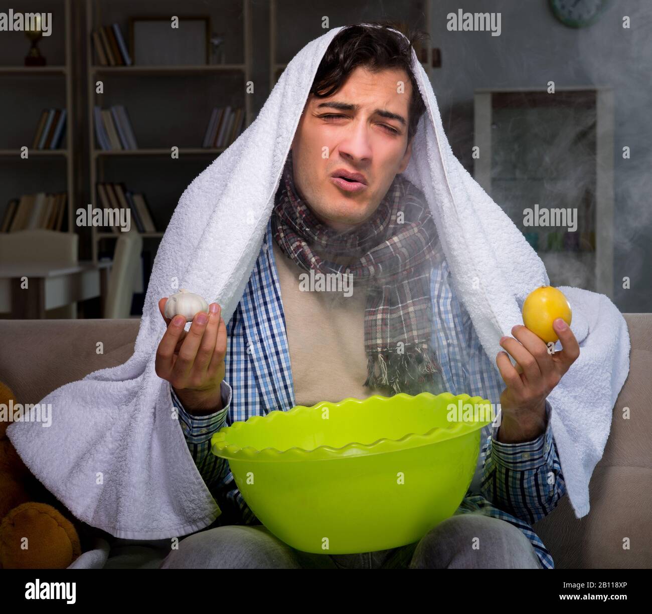 Sick man doing inhalation at night in home Stock Photo - Alamy