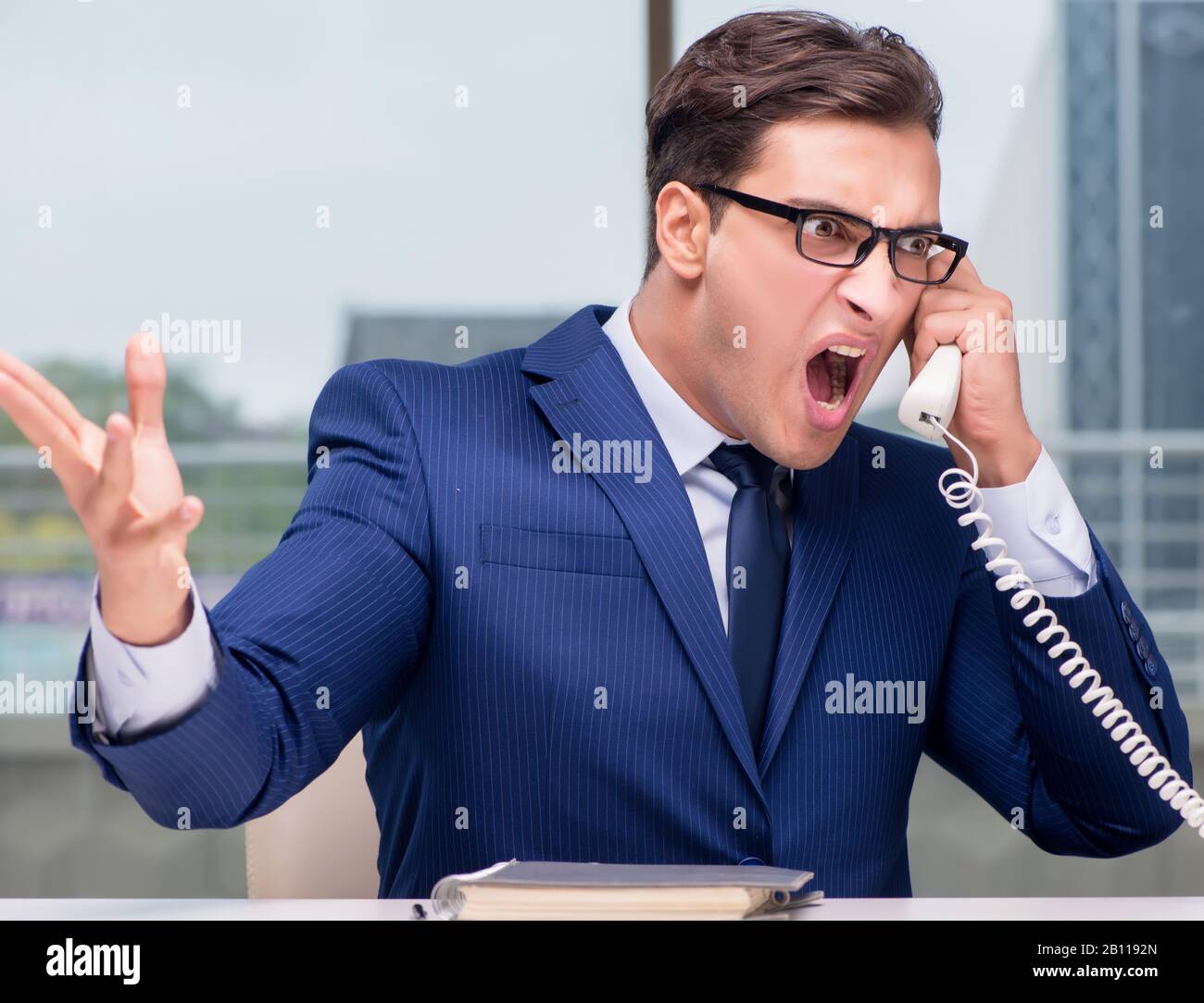 The angry call center employee yelling at customer Stock Photo - Alamy