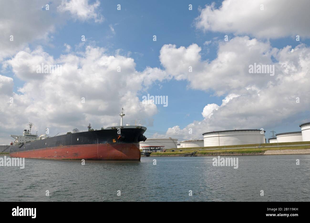 Oil tanker moored at storage terminal Stock Photo - Alamy