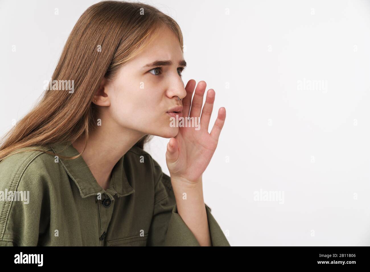 Photo of concentrated caucasian woman looking forward and screaming ...