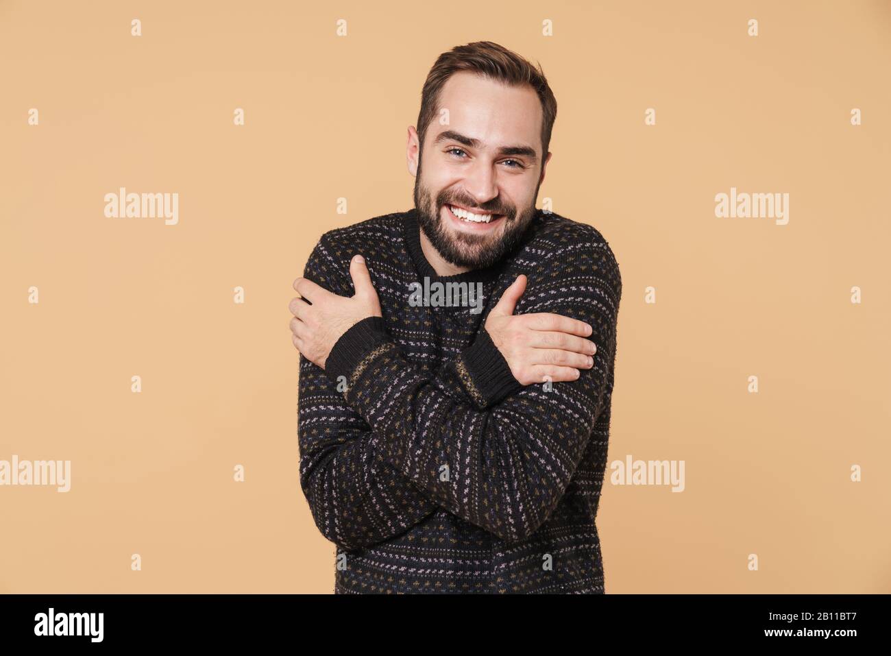 Man hugging himself hi-res stock photography and images - Alamy