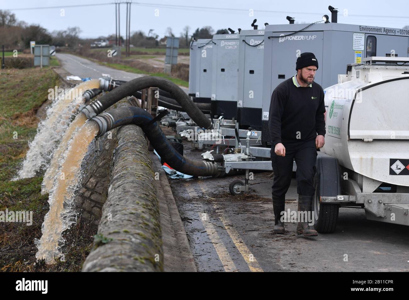 The Environment Agency sets up pumps to quell the levels of the River Lugg in Mordiford ...