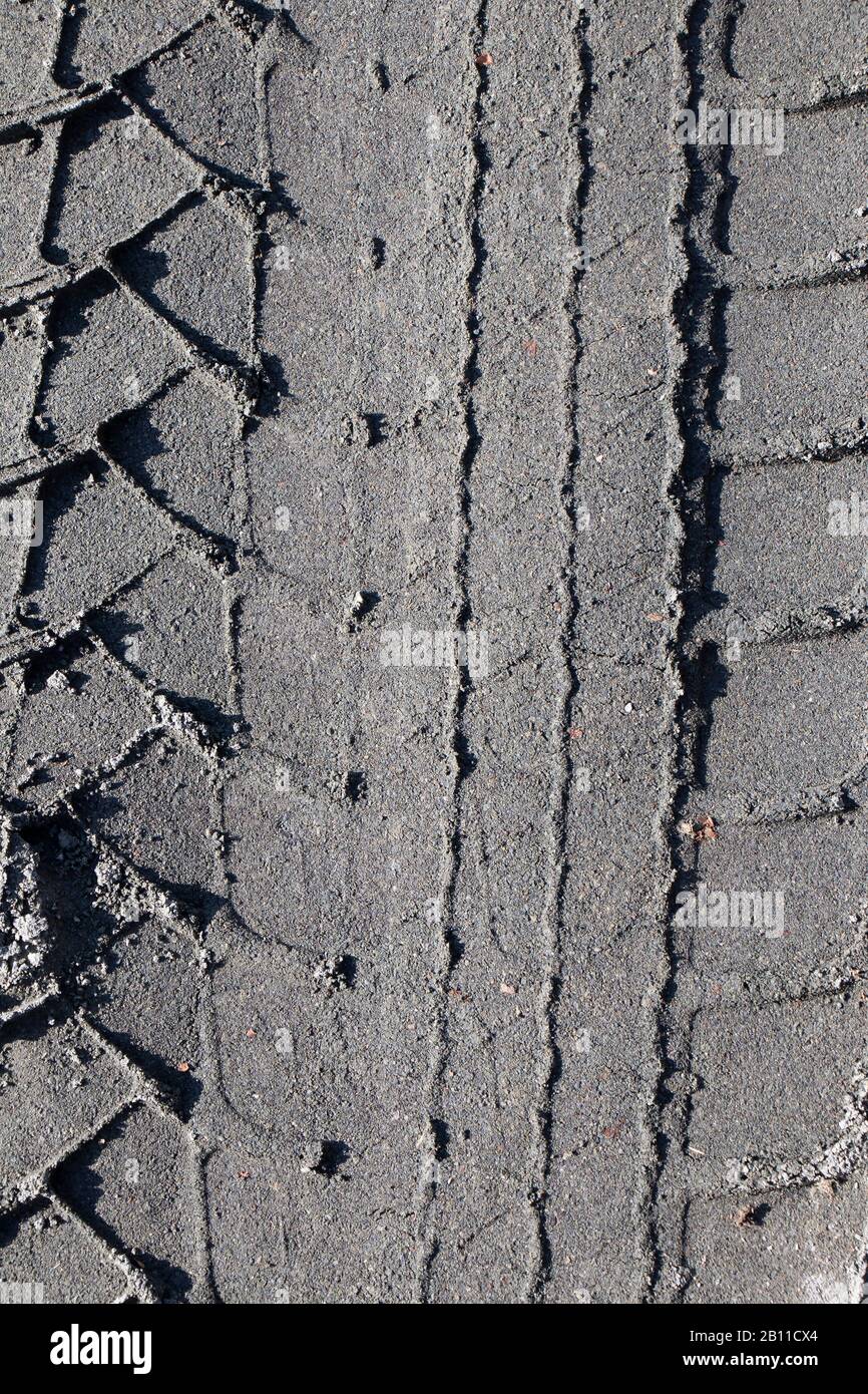 Tire imprints on the sandy road in black and white Stock Photo - Alamy