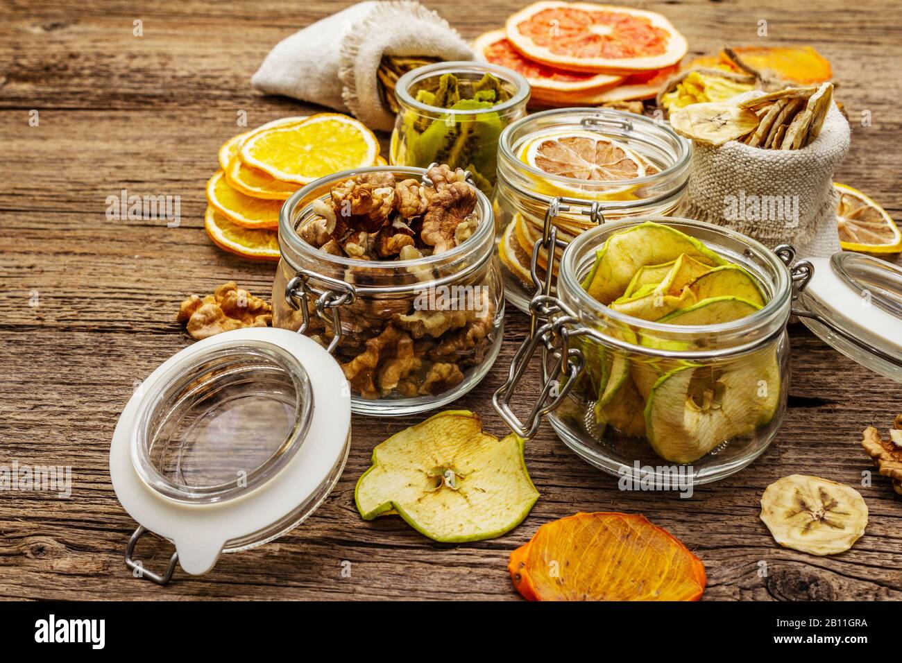 Zero waste food shopping concept. Assortment of dried fruits, walnuts ...