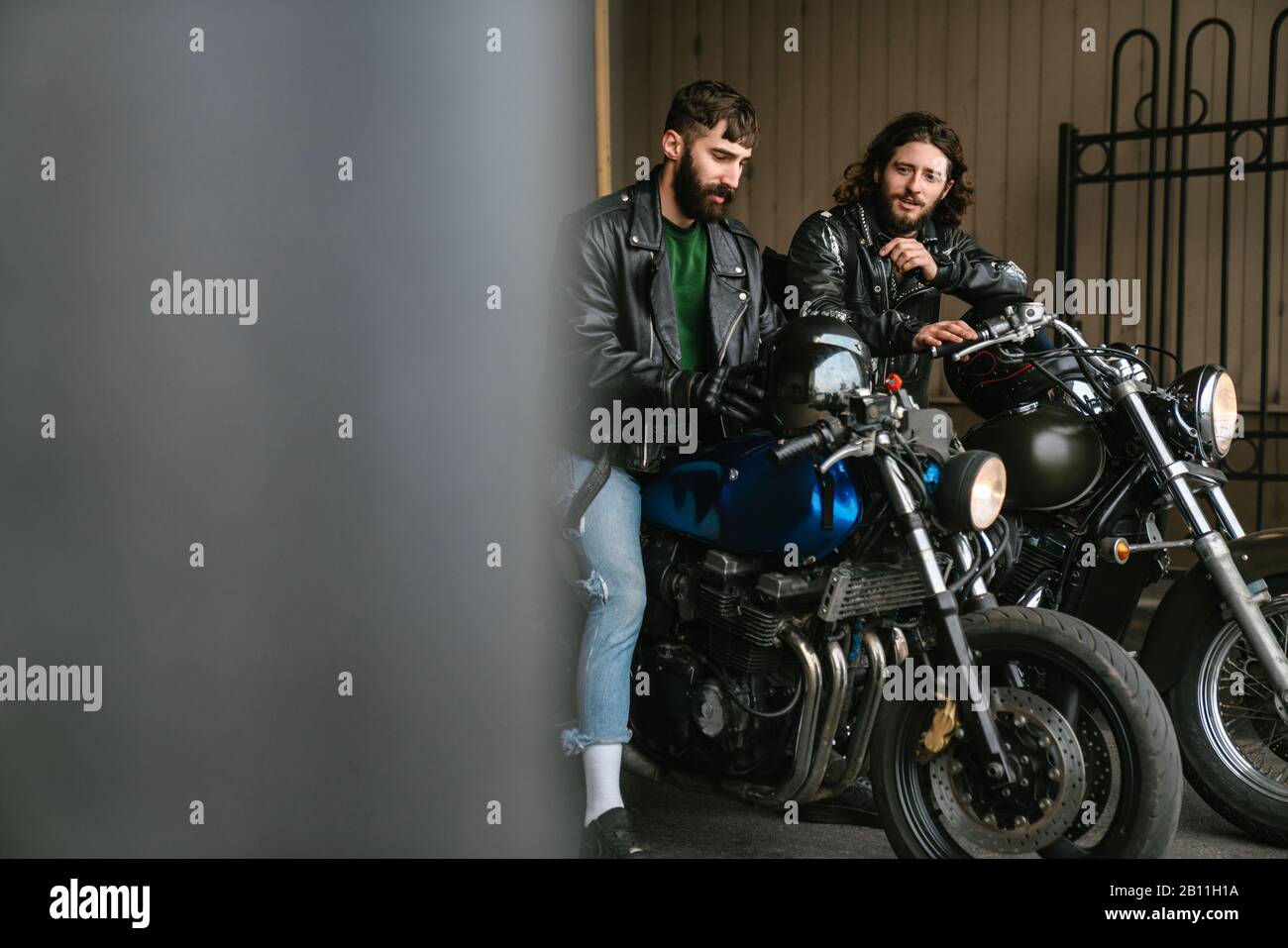 Two young men on motorcycles hi-res stock photography and images - Alamy