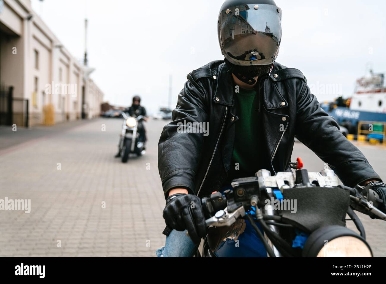 Bikers wearing helmets hi-res stock photography and images - Alamy