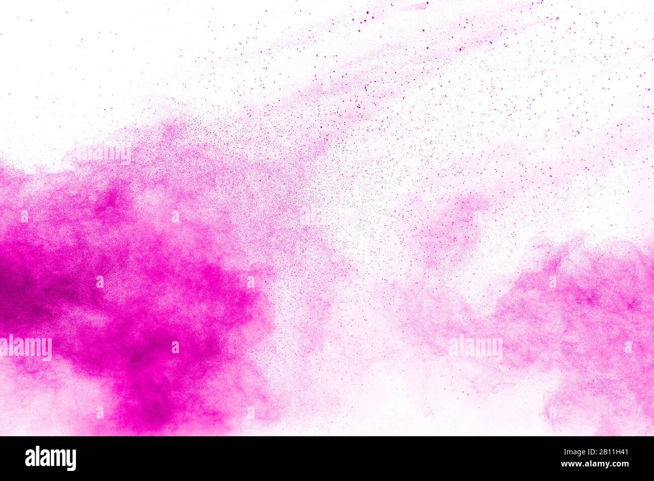 Abstract deep pink powder explosion on white background. Freeze motion ...