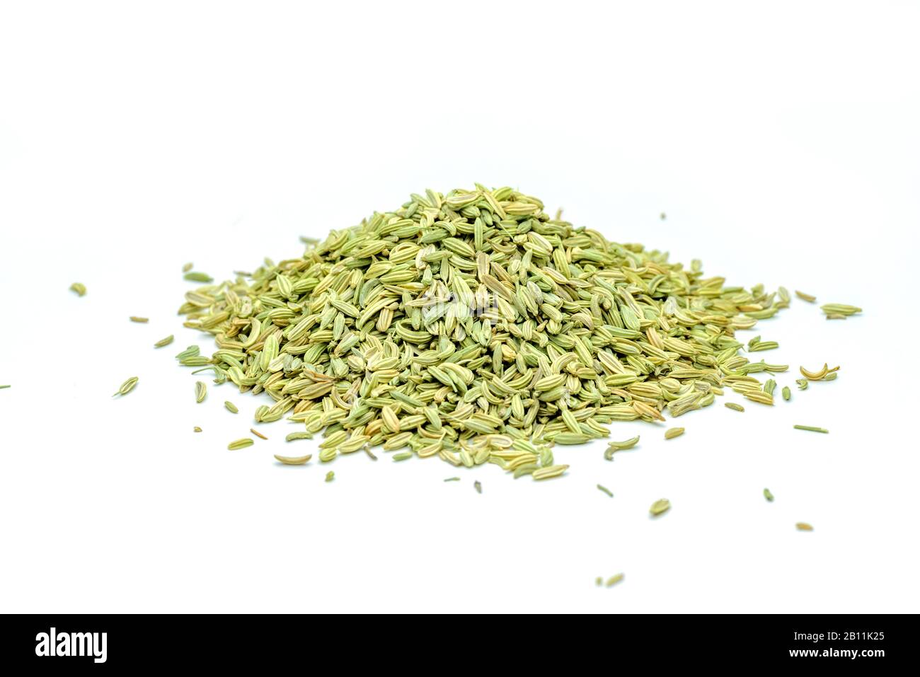 fennel seeds loose on a white background Stock Photo - Alamy