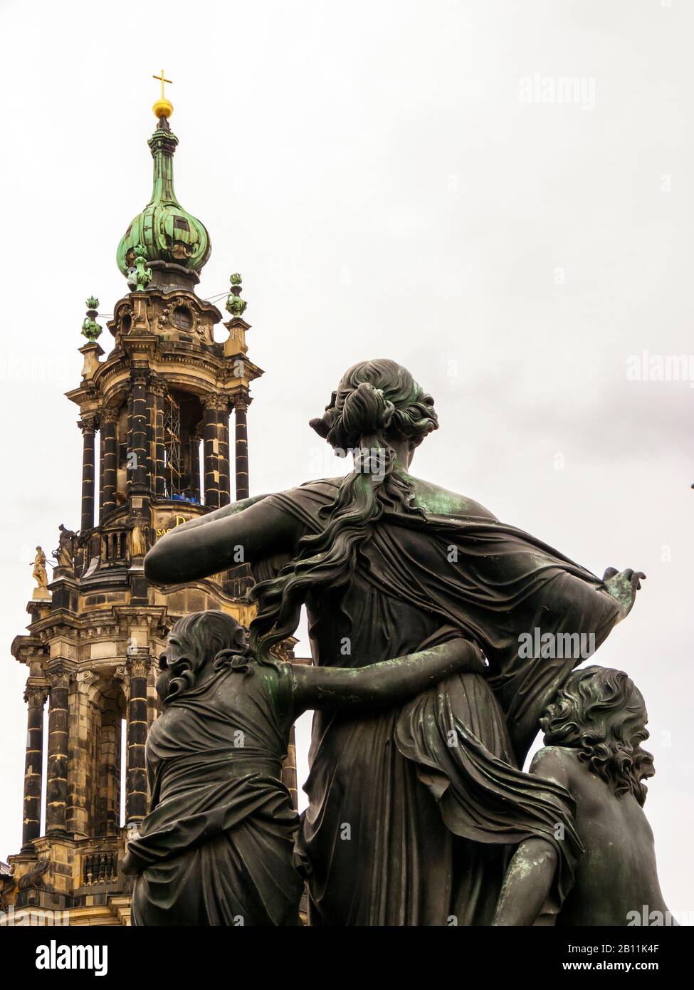 Statue in front of the bell tower of the Dresden Cathedral, the ...