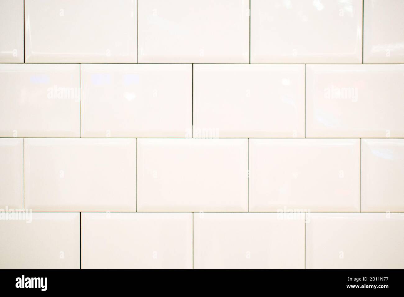 white ceramic rectangular tiles in rectangle form with black filling ...