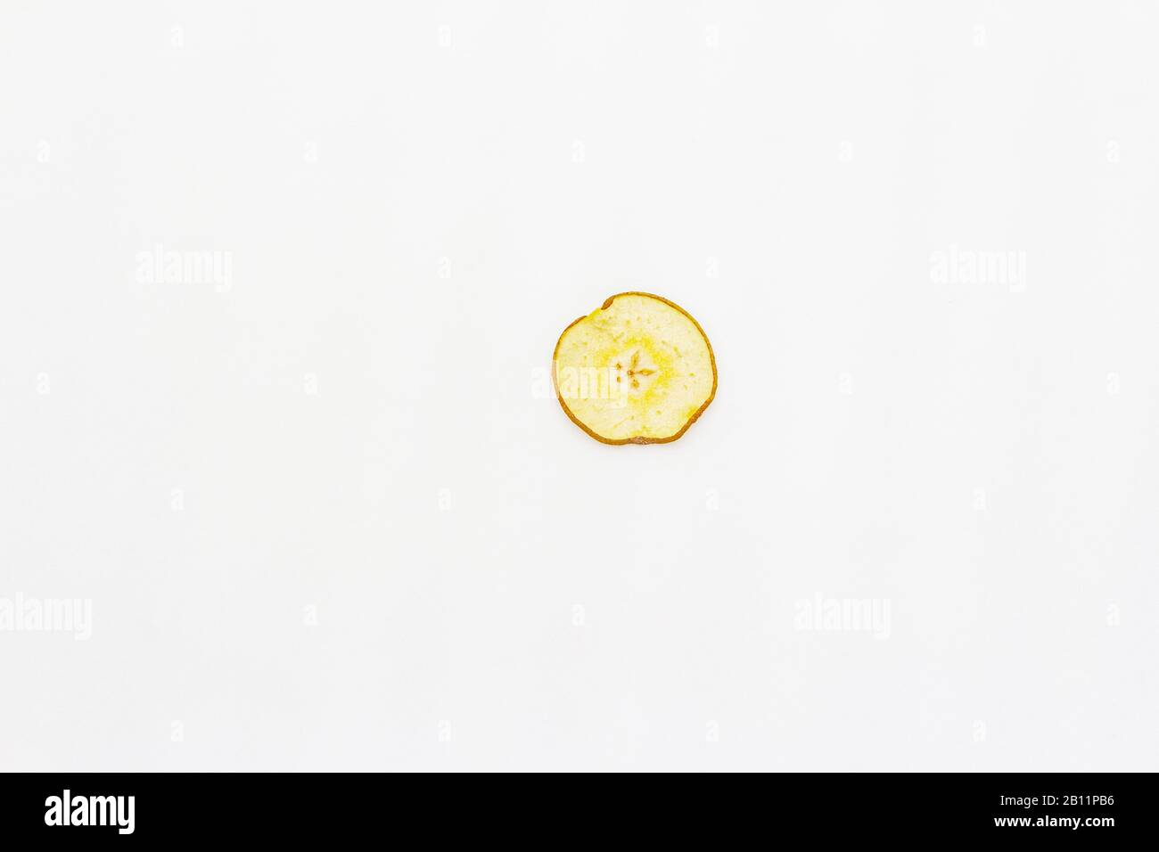 Dried single slice of pear isolated on white background. Healthy eating ...