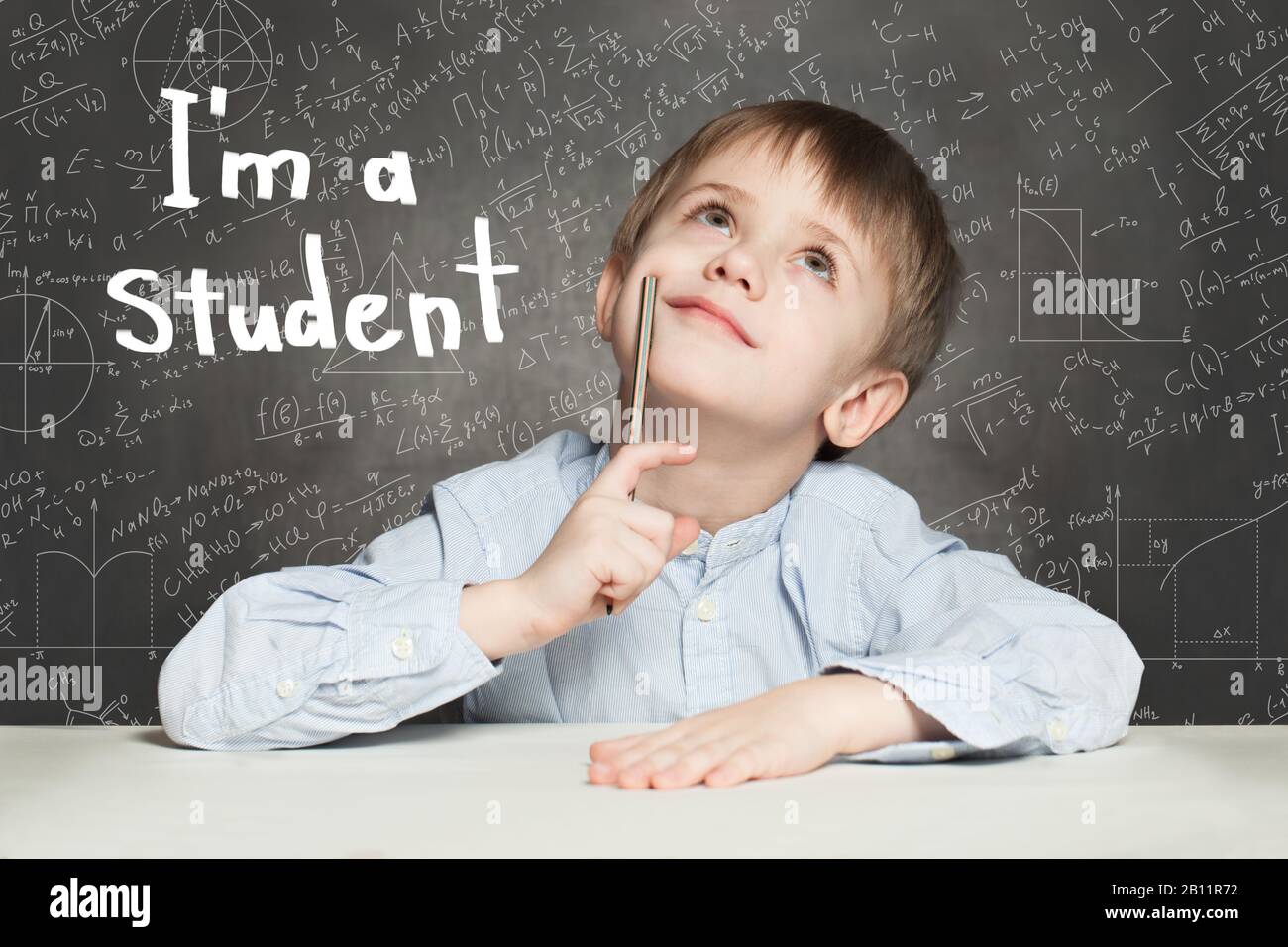 Student little boy and science background. Kid is thinking about ...