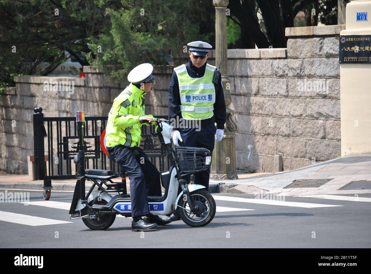 Chinese security guards hi-res stock photography and images - Alamy