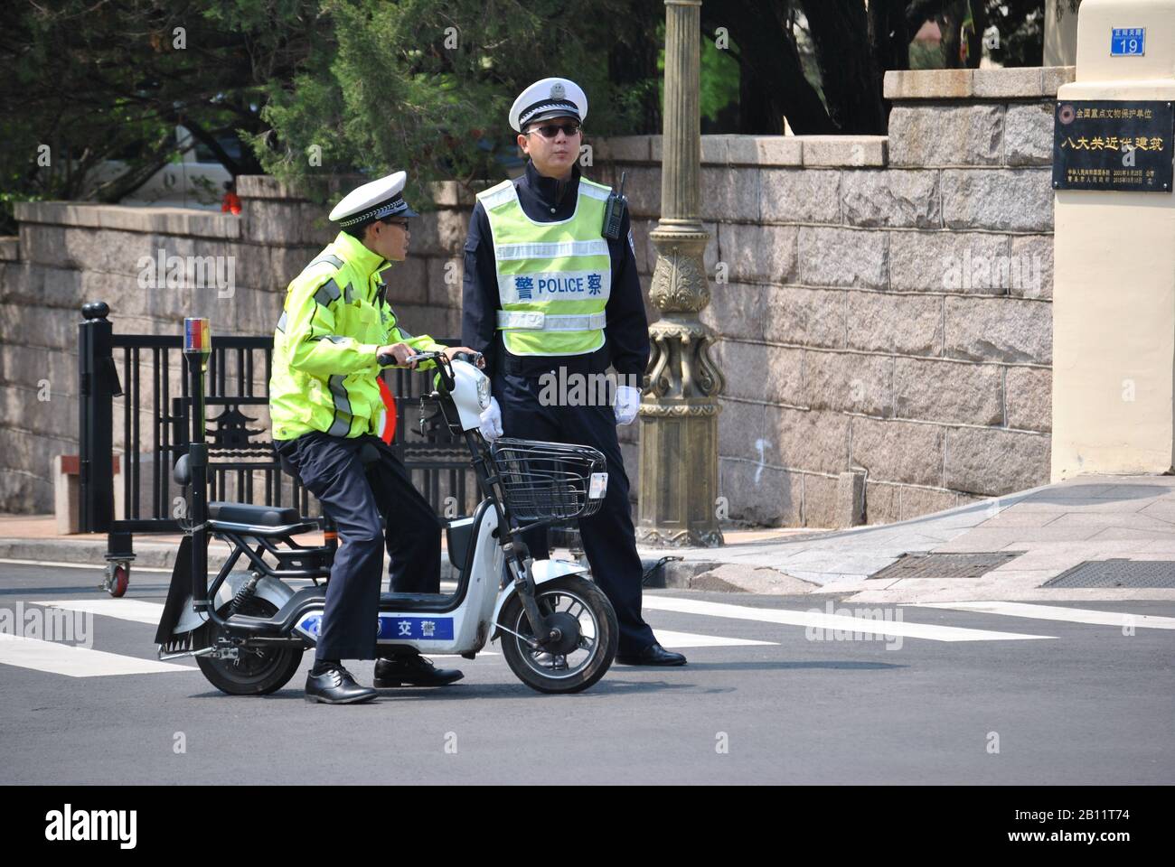 Chinese Security Guards Stock Photo - Alamy