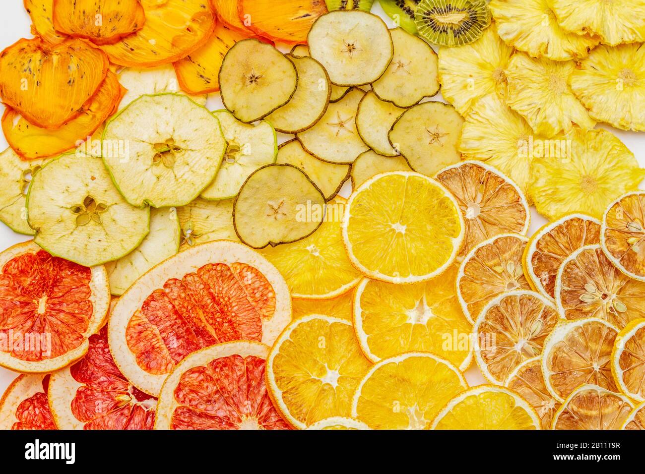 Assorted dried fruits, isolated on a white background. Healthy eating ...
