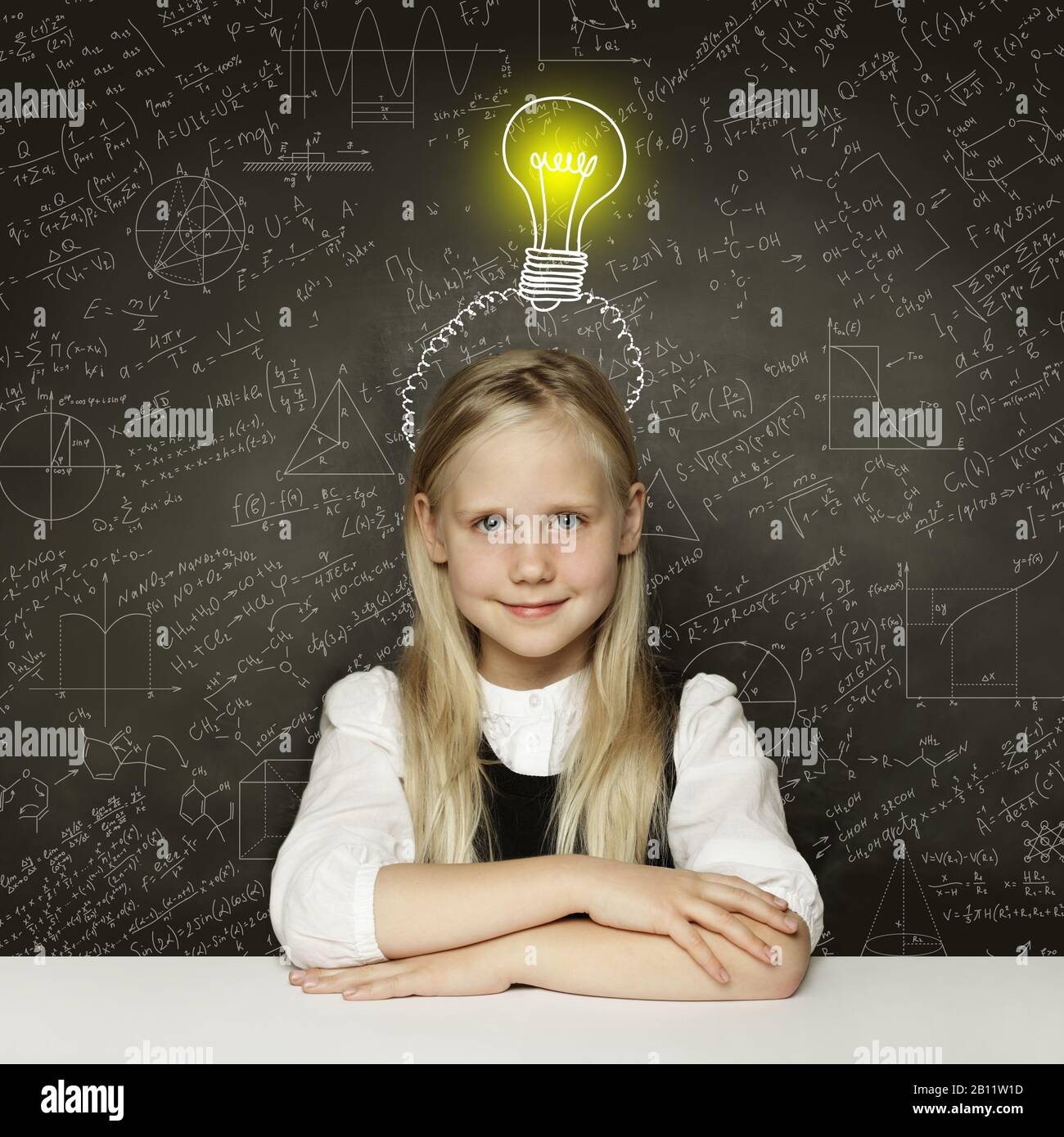 Child girl with lightbulb. Concept Ideas and projects Stock Photo - Alamy