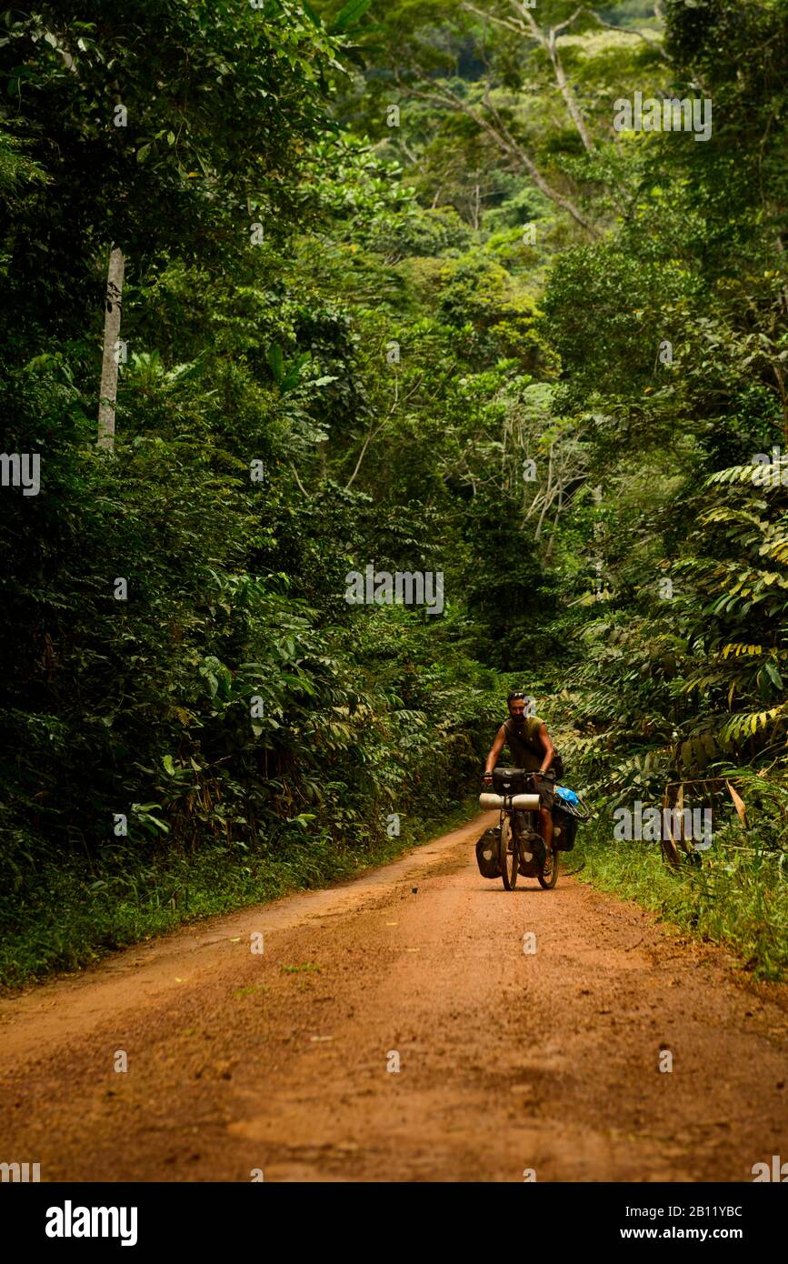African Riding A Bicycle In Africa High Resolution Stock Photography ...