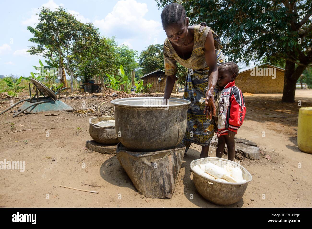 Woman preparing food, Democratic Republic of the Congo, Africa Stock ...