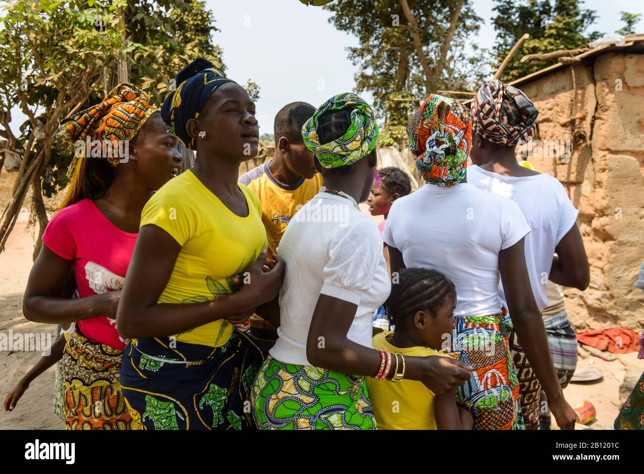 Woman and children dancing in circles hi-res stock photography and ...