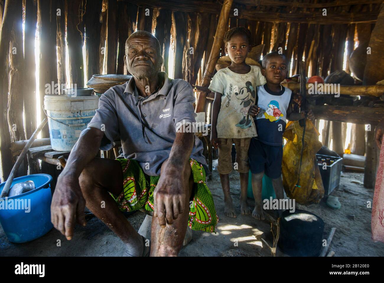 Man with children, indigenous tribal groups in the province of Cunene ...