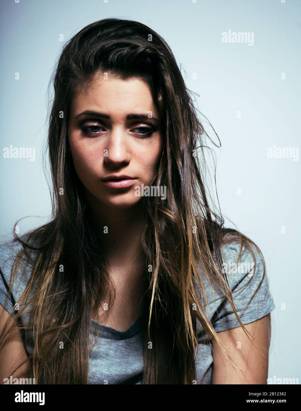 problem depressed teenage with messed hair and sad face Stock Photo - Alamy