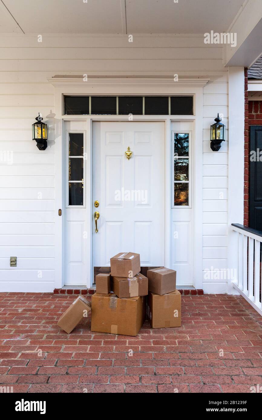 Packages at the front door hi-res stock photography and images - Alamy