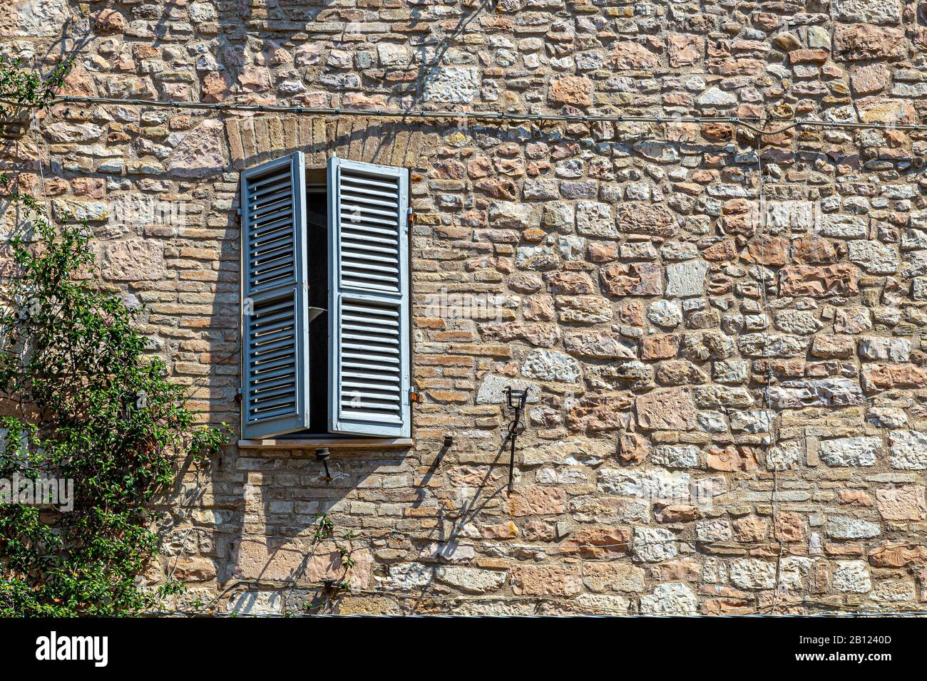windows in the facades of ancient medieval houses Stock Photo - Alamy