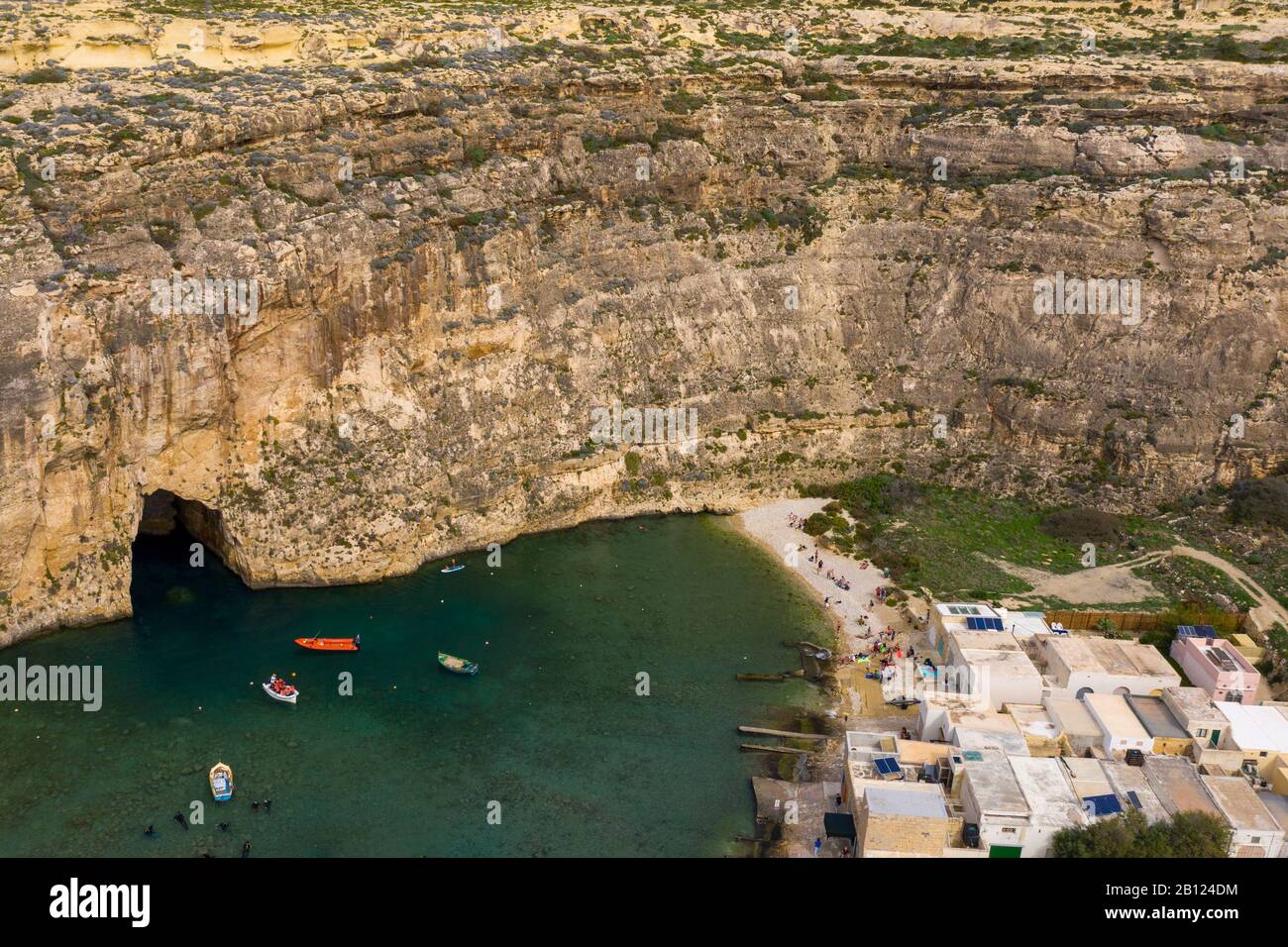 The Inland Sea and tourist boat. Dwejra is a lagoon of seawater on the ...
