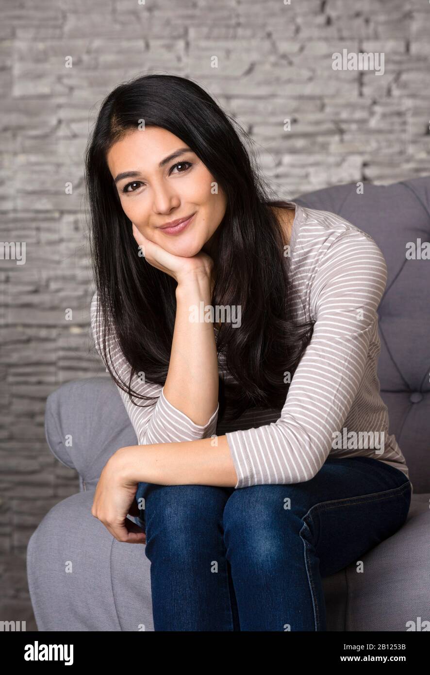 Female asiatic woman sitting on hi-res stock photography and images - Alamy