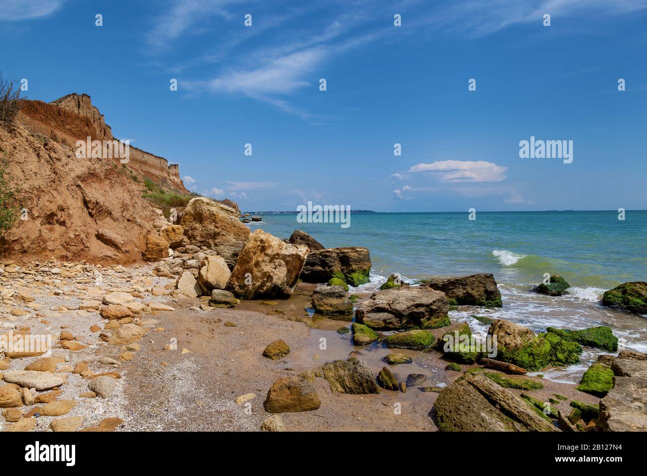 Yellow sandy rocks and stones of various forms on the Black Sea coast ...