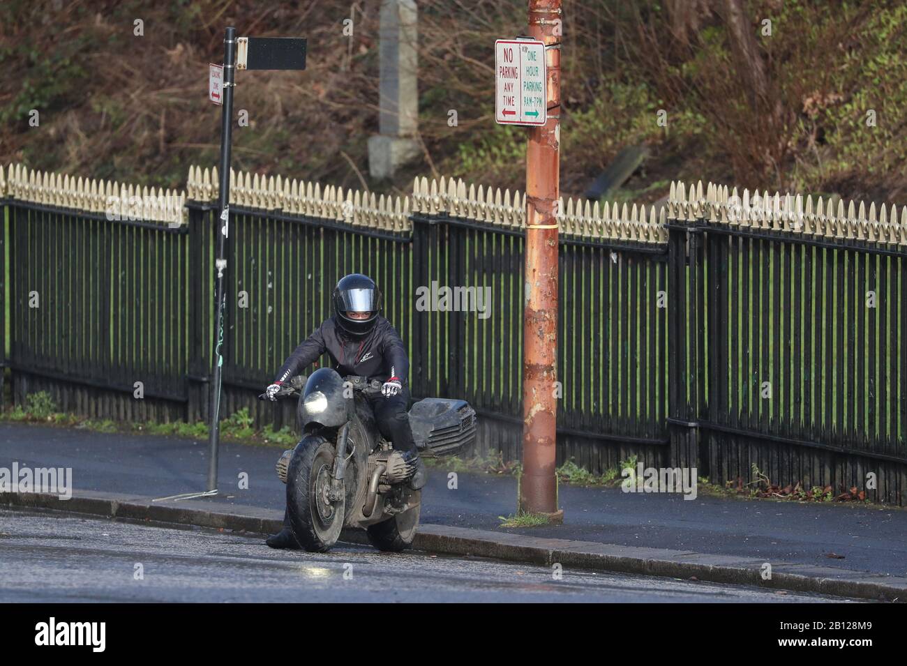 A man rides a motorcycle as filming continues in Glasgow for a new ...