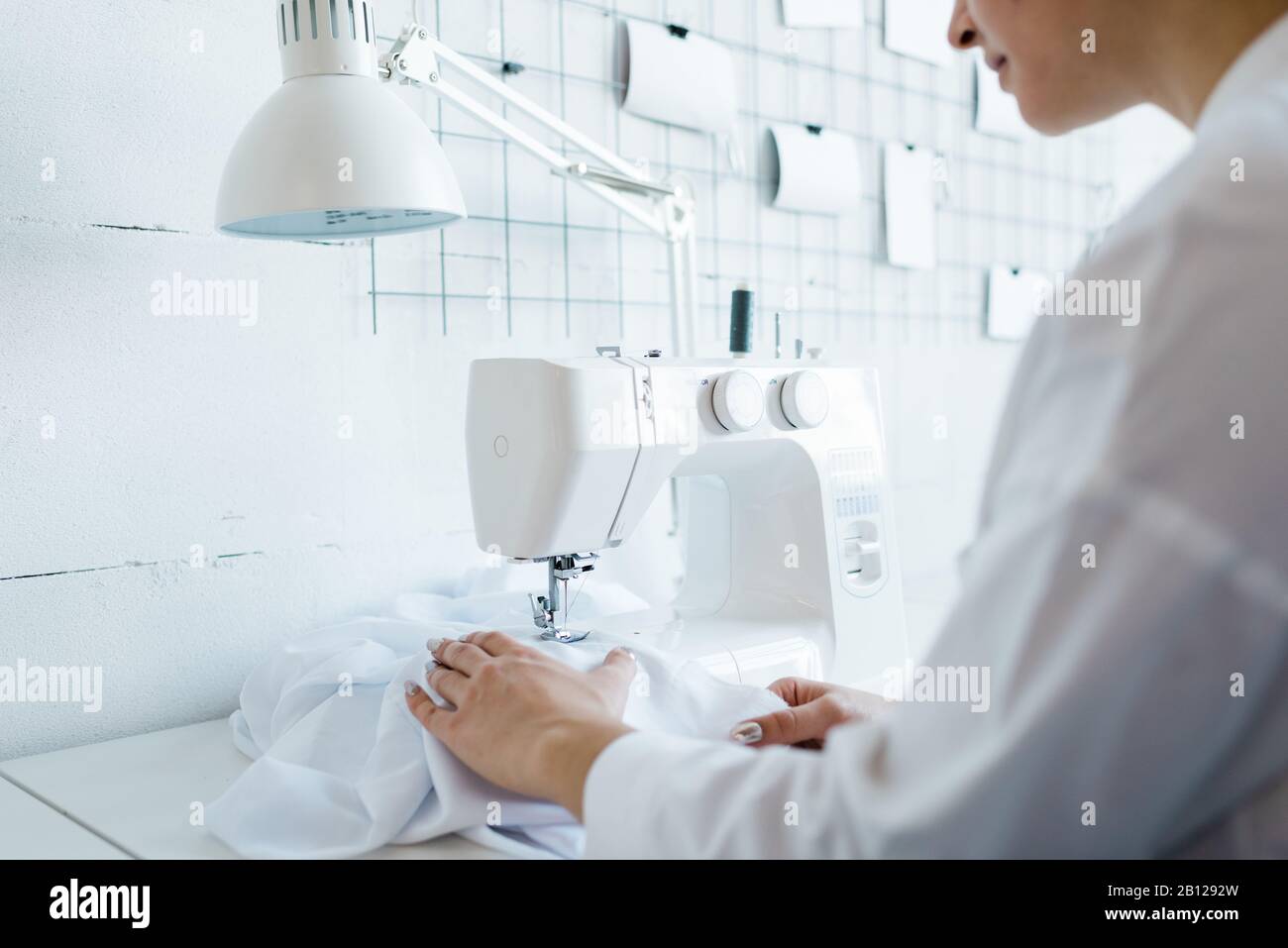 People sewing hi-res stock photography and images - Alamy
