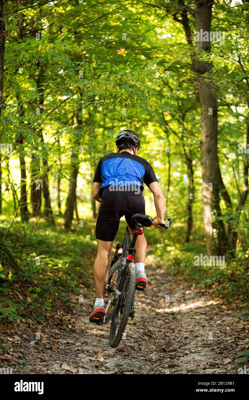 Back view biker hi-res stock photography and images - Alamy