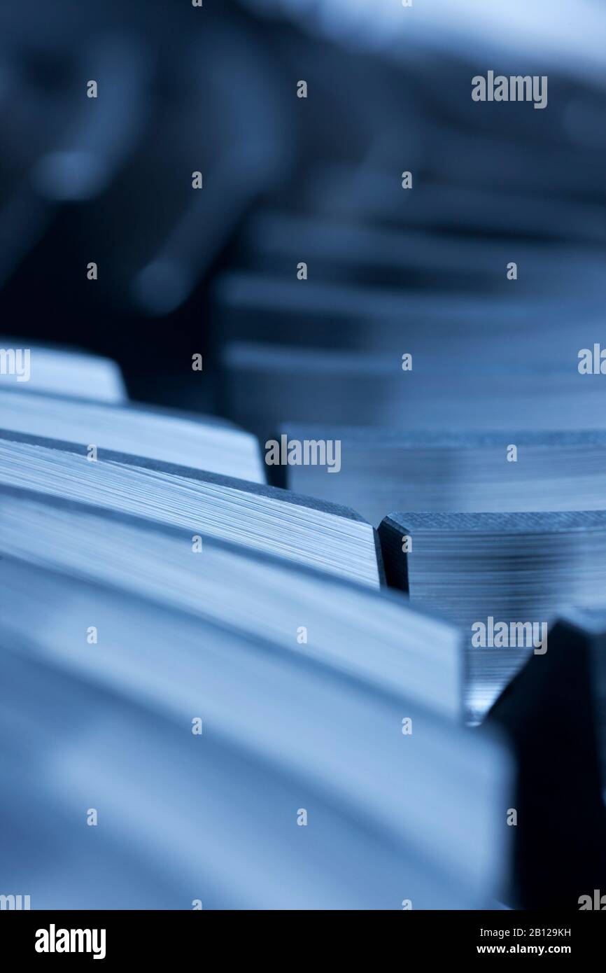 Three cog wheels working together in an engine Stock Photo - Alamy