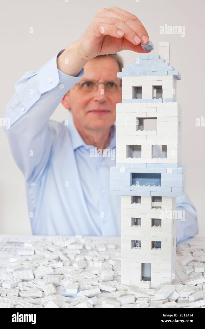 Toy brick house hi-res stock photography and images - Alamy