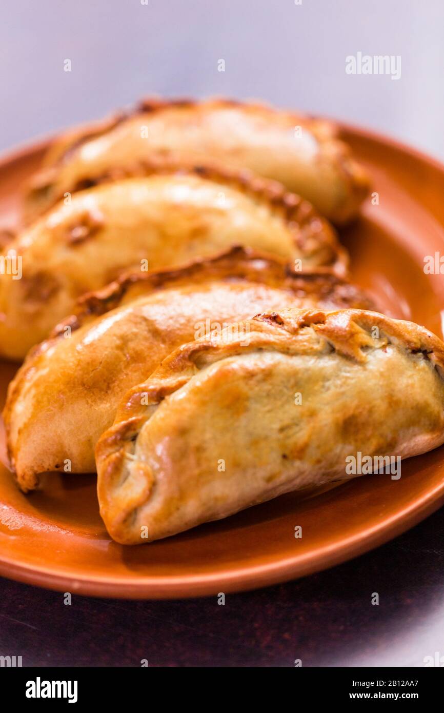 Homemade large empanadas with different staffings Stock Photo - Alamy