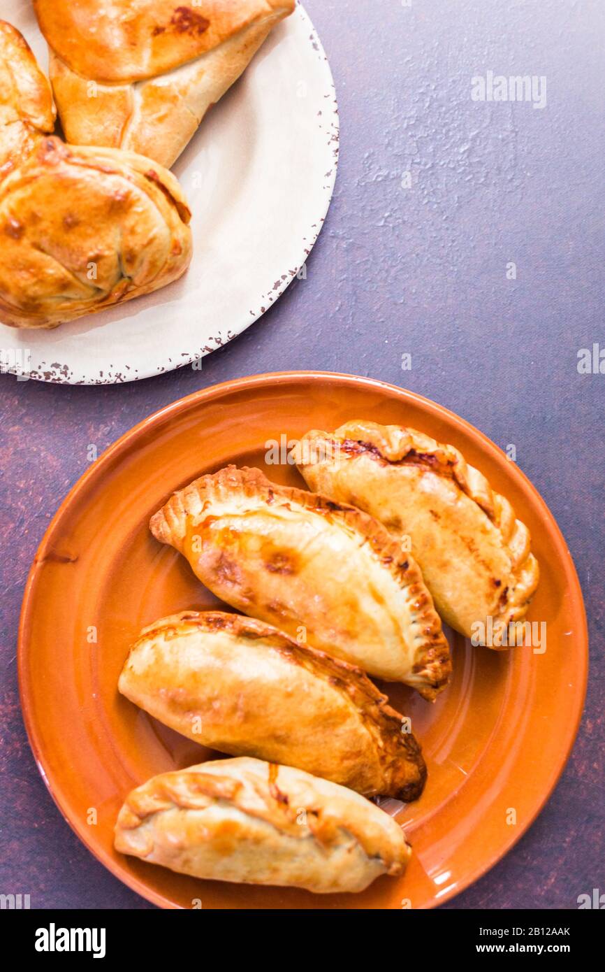 Homemade large empanadas with different staffings Stock Photo - Alamy