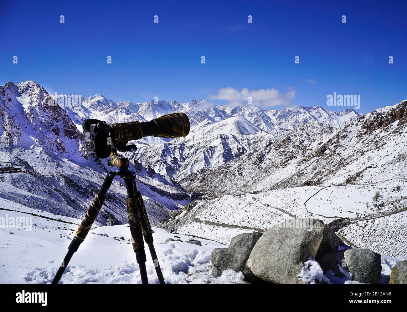 Tourist expedition searching snow leopard in Ulley valley. Ladakh ...