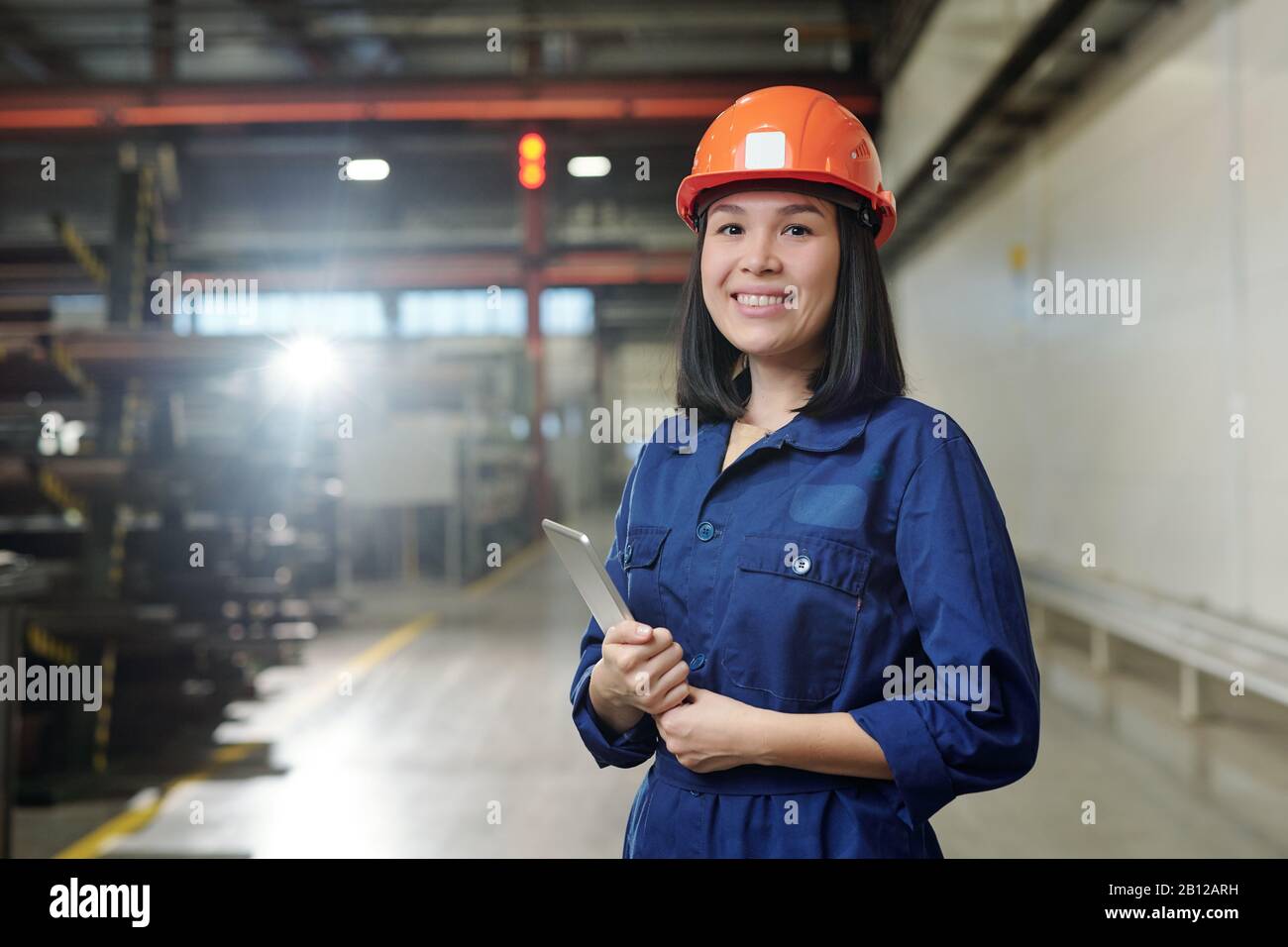 Engineer worker in uniform holding hi-res stock photography and images ...