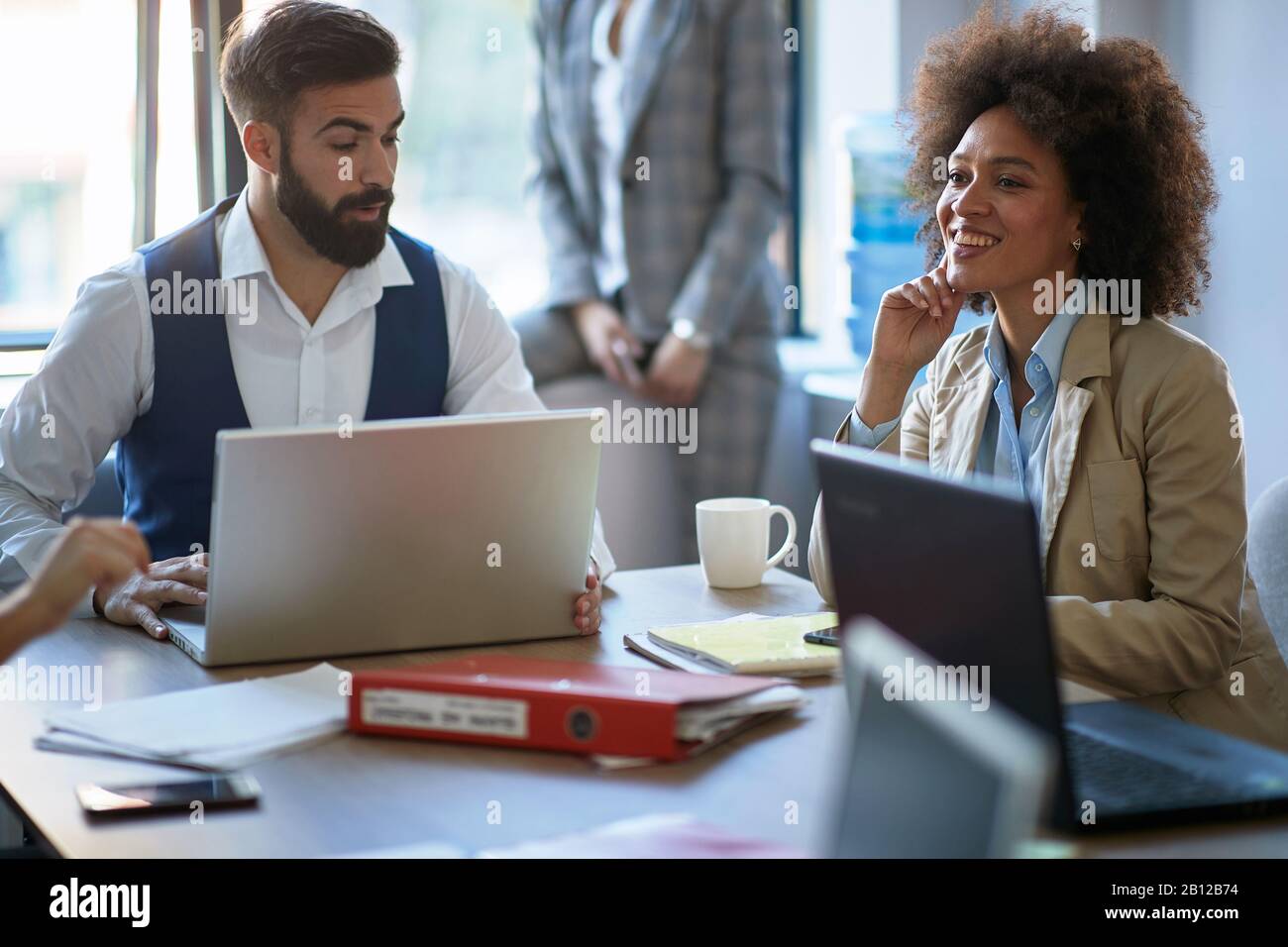 Coworkers documents hi-res stock photography and images - Alamy