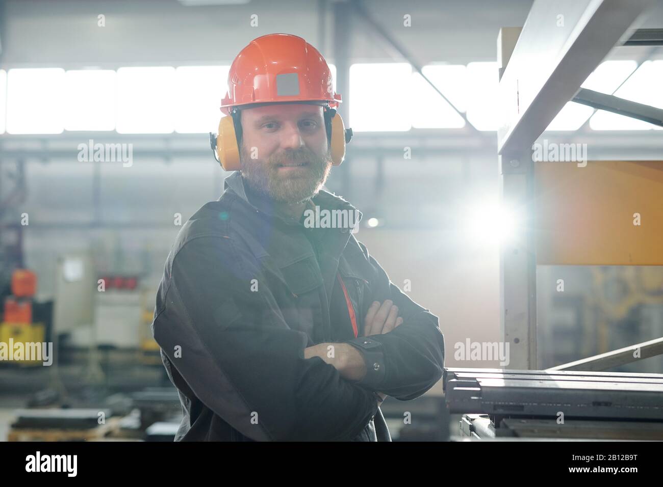 Young engineer working in the factory hi-res stock photography and ...