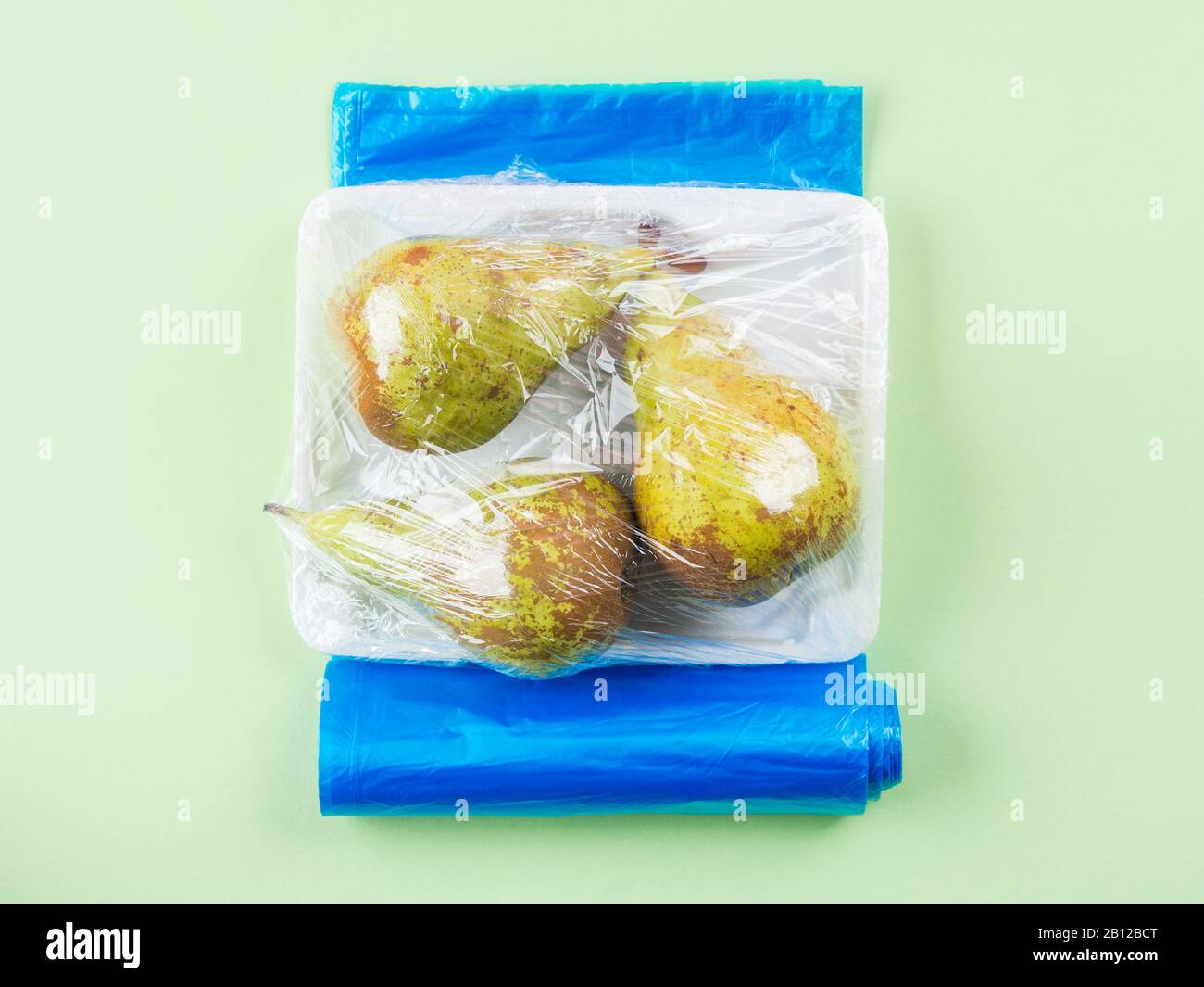 Fresh produce wrapped in plastic film Stock Photo - Alamy