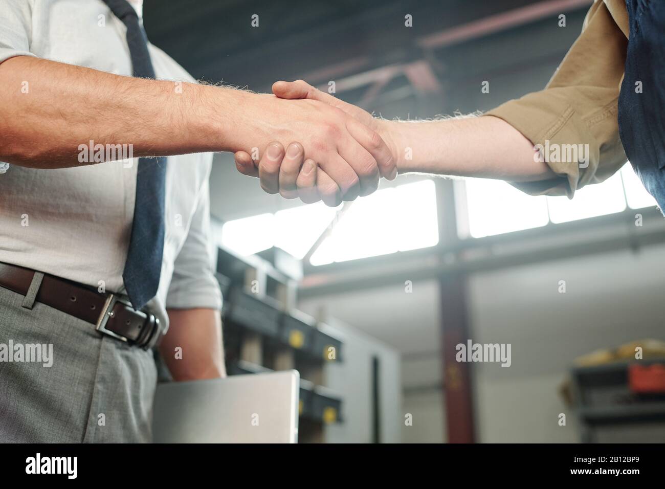 Coworker Handshake High Resolution Stock Photography and Images - Alamy